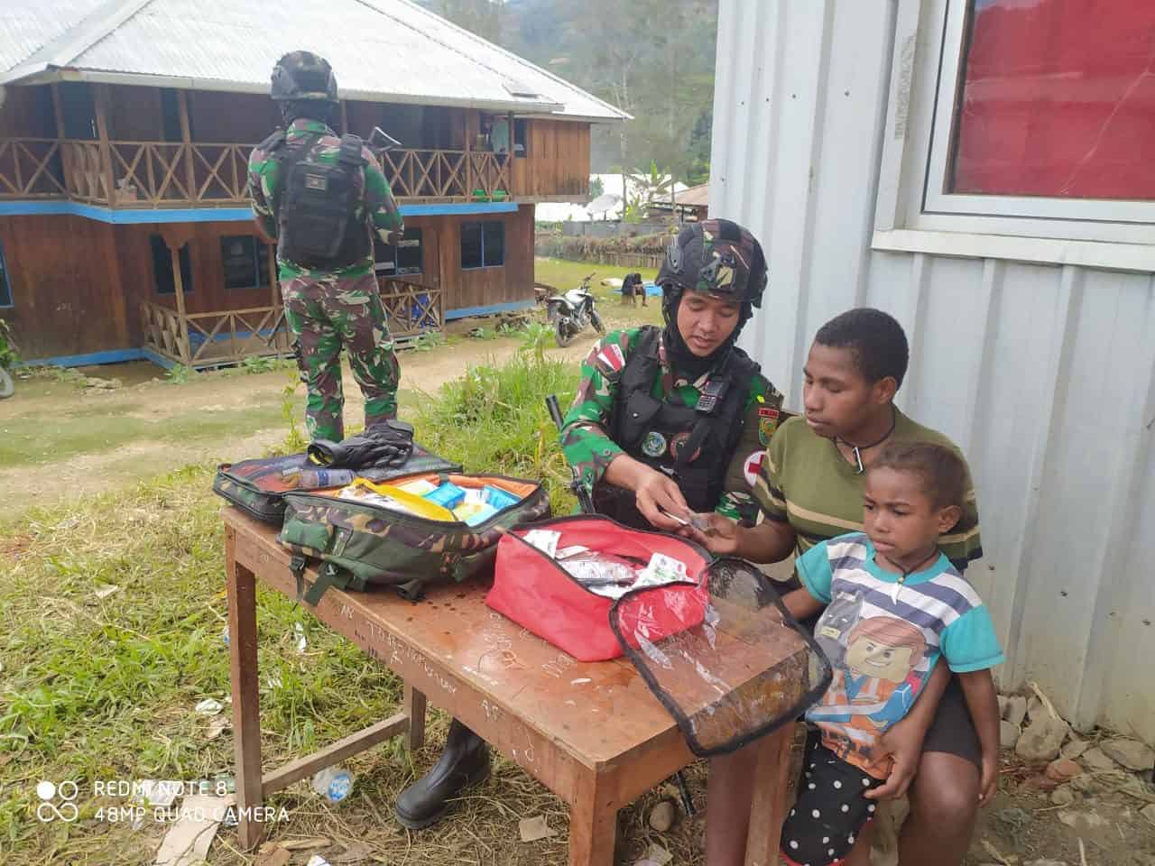 Pelayanan Kesehatan Keliling Satgas Pamtas RI PNG Yonif Raider 142/KJ Diminati Warga